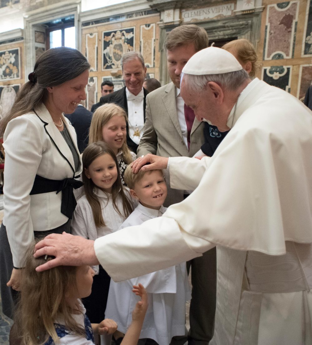 Pope Francis greets children during an audience with representatives ...