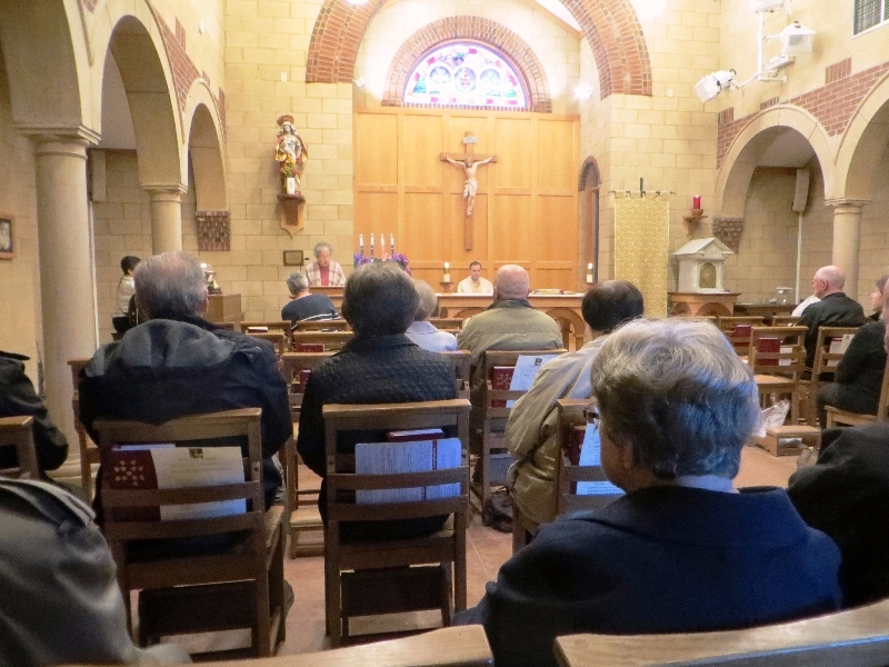 Worshipers attend Mass in the Holy Spirit Chapel before the Dec. 1 ...