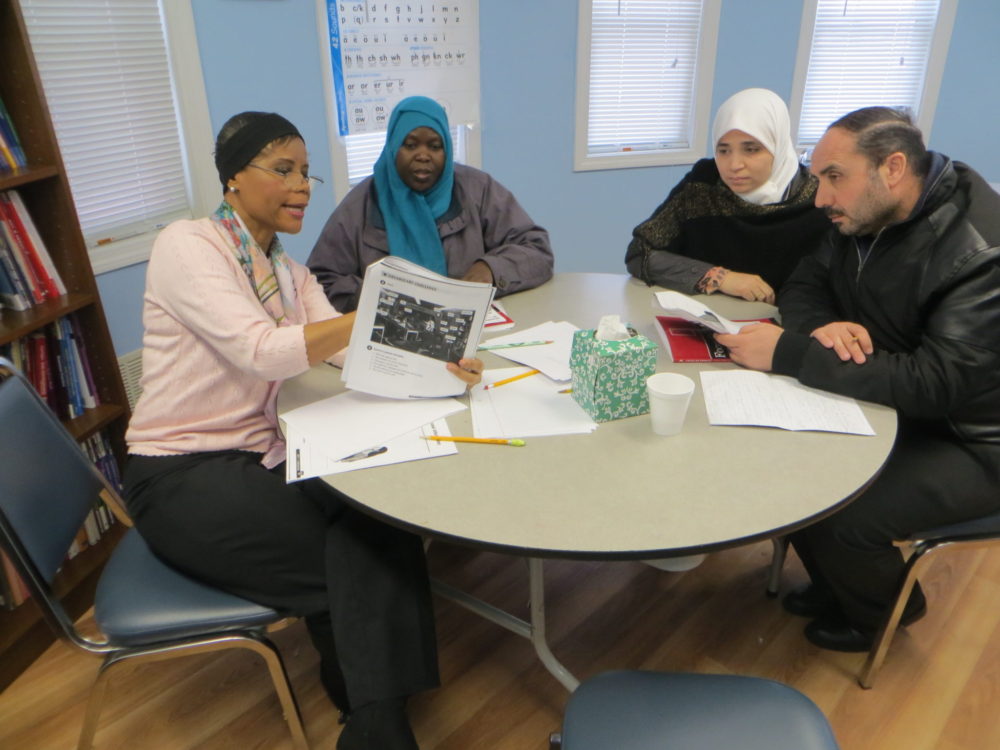 An English as a Second Language (ESL) instructor conducts a session at ...