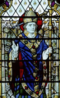 A stained-glass window of St. Thomas Becket is seen at St. Alban’s ...