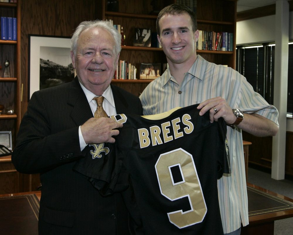 Drew Brees, quarterback of the New Orleans Saints, and Tom Benson, team ...
