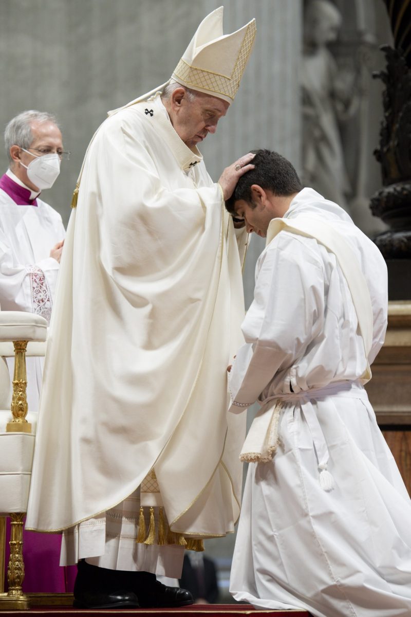 Pope Francis ordains one of nine new priests during an ordination Mass ...