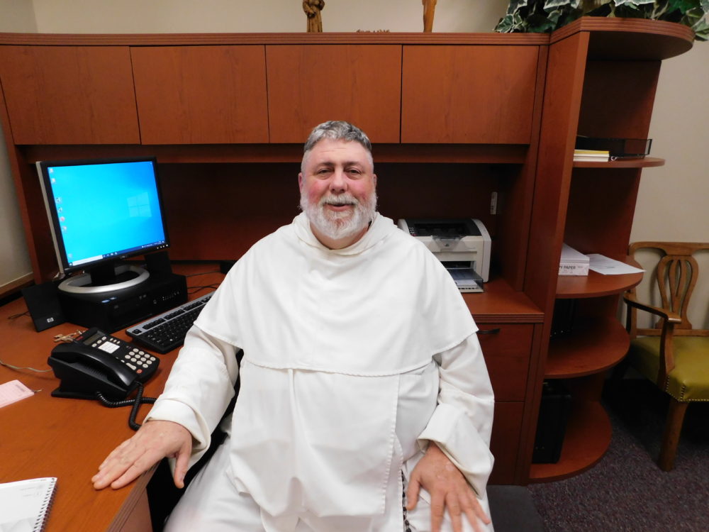 Father Judd sits in his office at the Bishop Maguire Pastoral Center in ...
