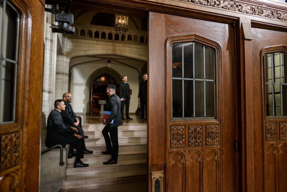 Seminarians chat outside the chapel at Sacred Heart Major Seminary in ...