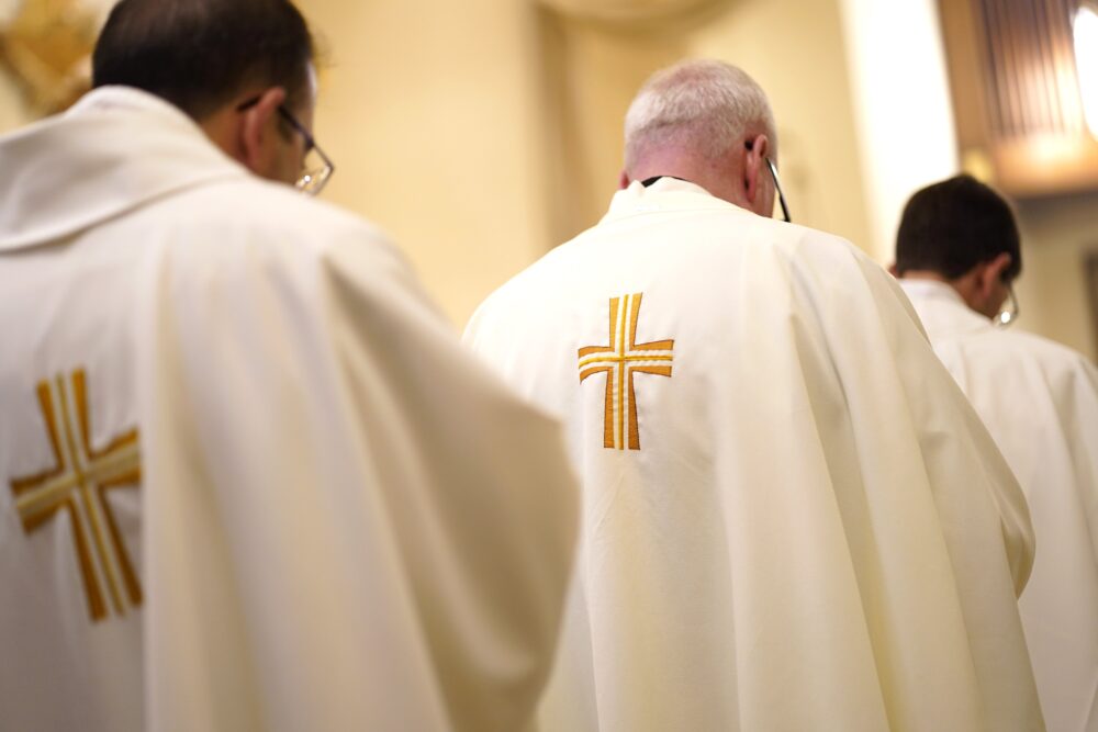 Priests are seen during a special Mass for vocations at Cure of Ars ...