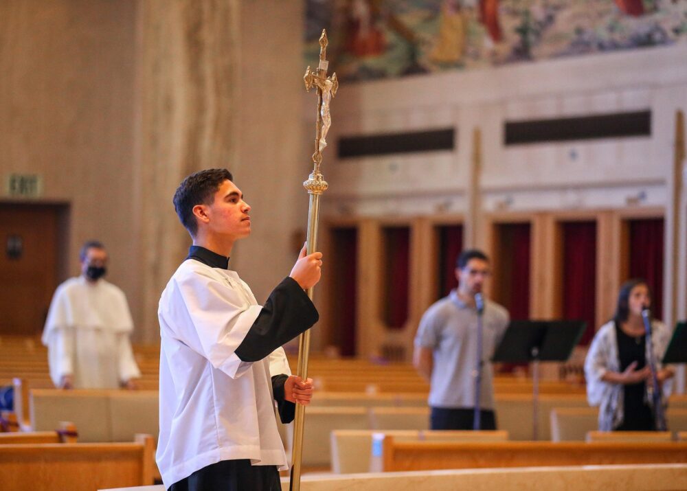 A Mass for the Rite of Christian Initiation of Adults takes place at St ...