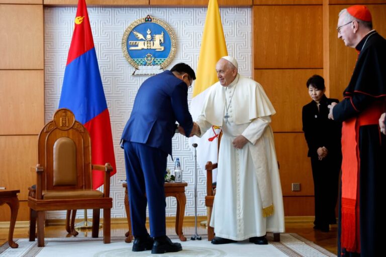 Pope Francis shakes hands with Gombojav Zandanshatar, chairman of ...