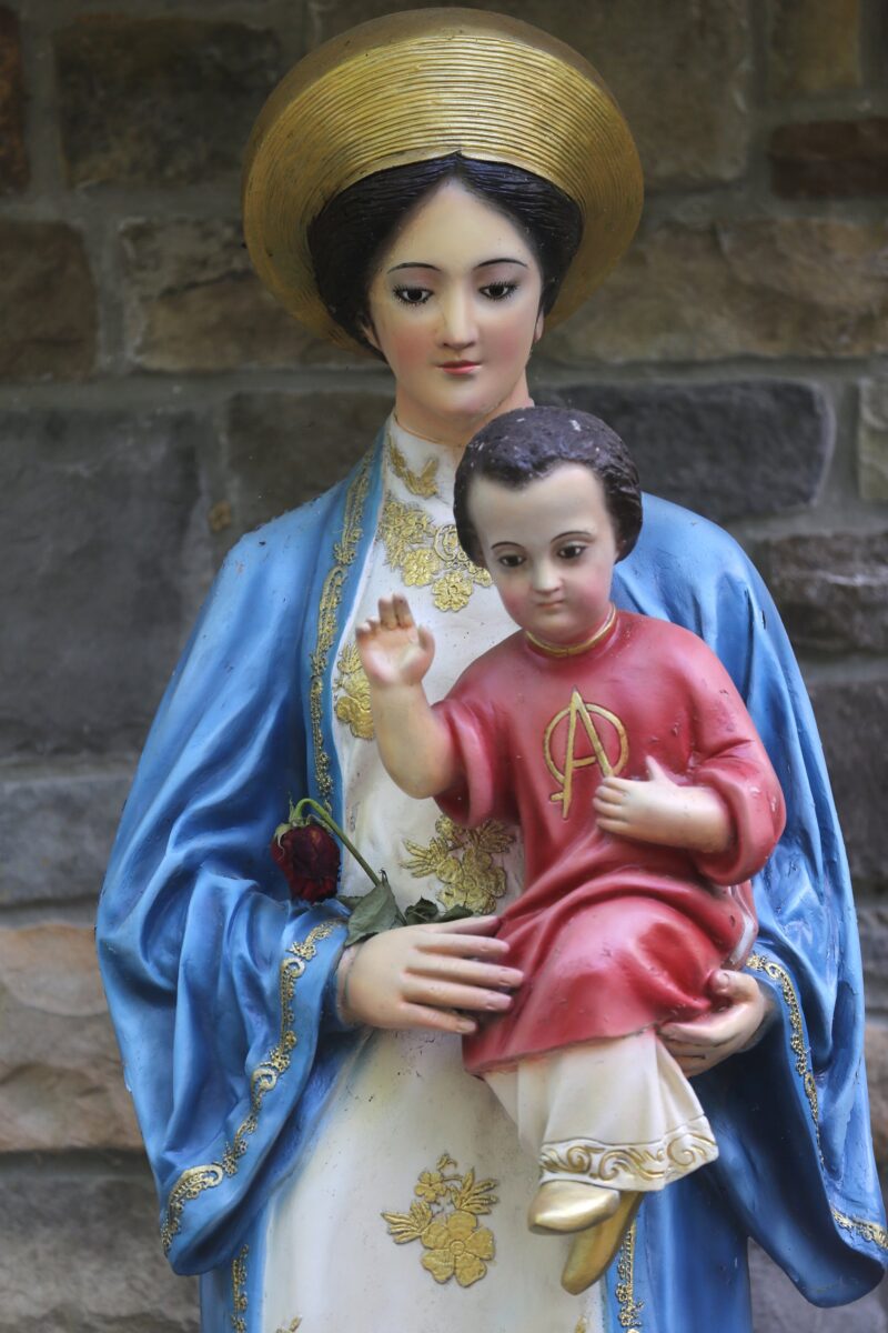 A statue of Our Lady of La Vang and the Christ Child is seen in this ...