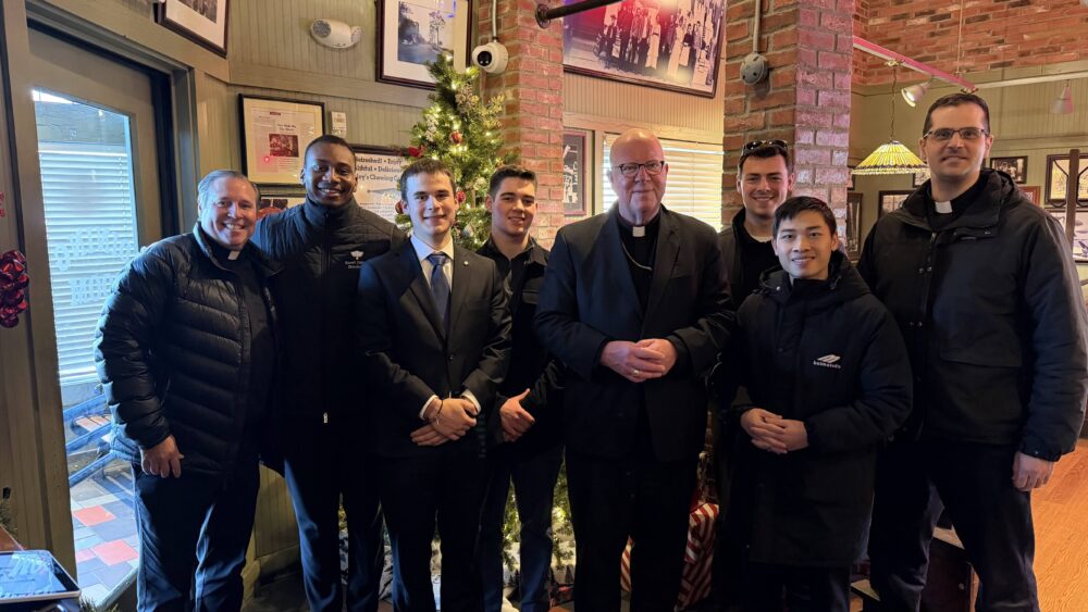 Seminarians pose for a picture with Bishop William D. Byrne, Father ...